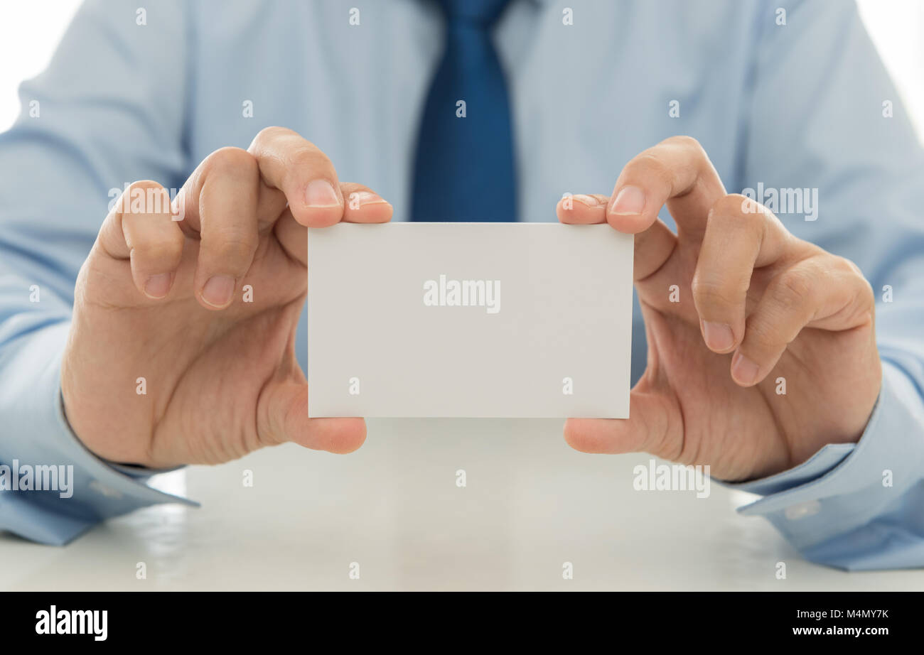 Sales show a business card to introduce itself to customers. free space ...