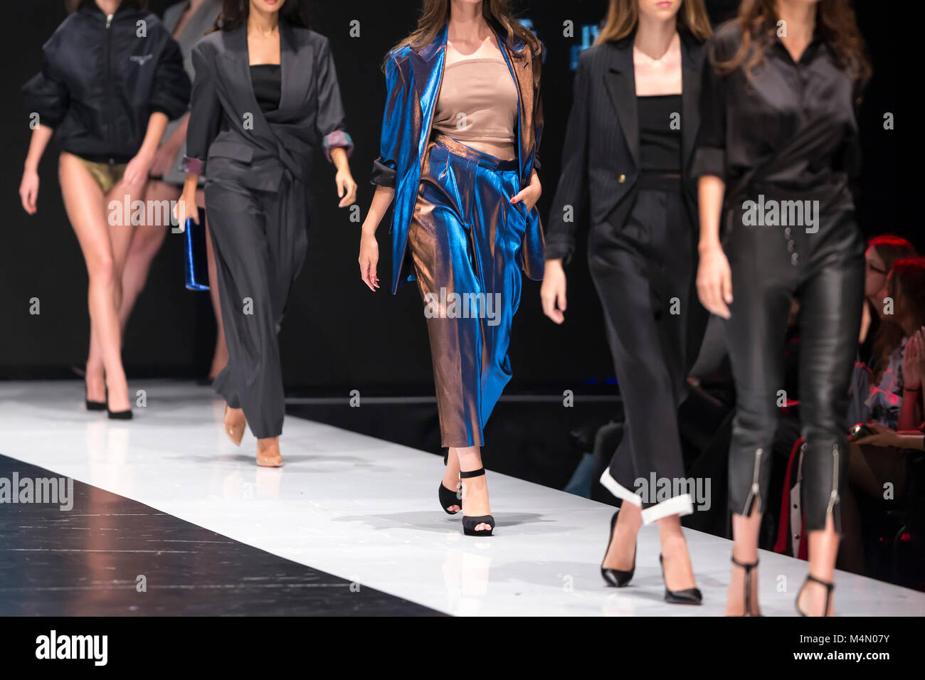 Female models walk the runway in different dresses during a Fashion ...