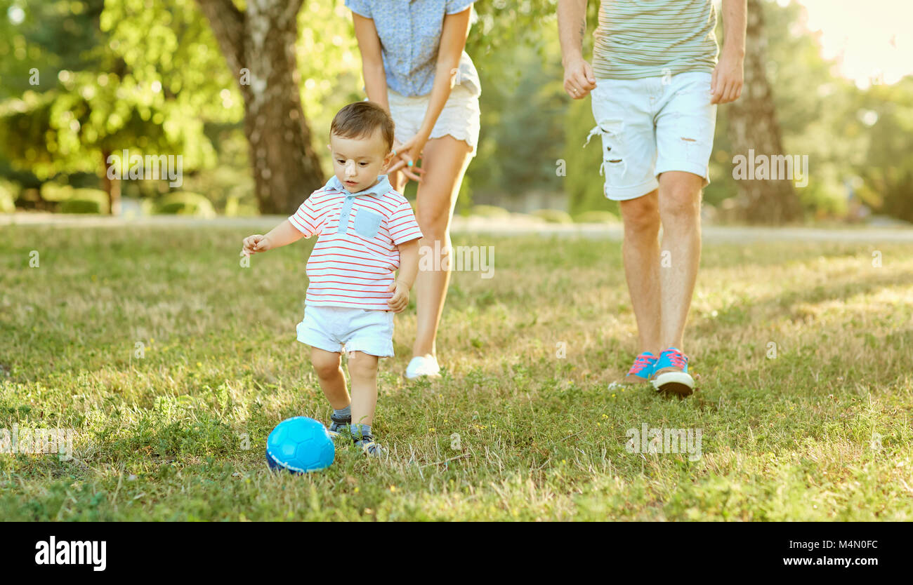 Happy family in nature Stock Photo - Alamy