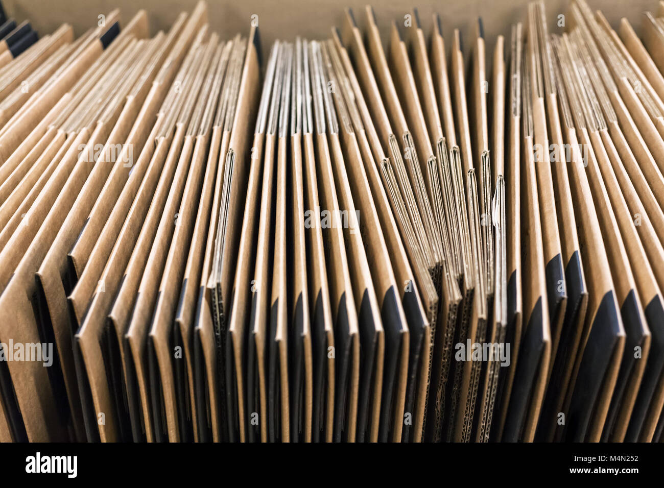 many non-assembled cardboard parcel boxes on stock close up Stock Photo ...