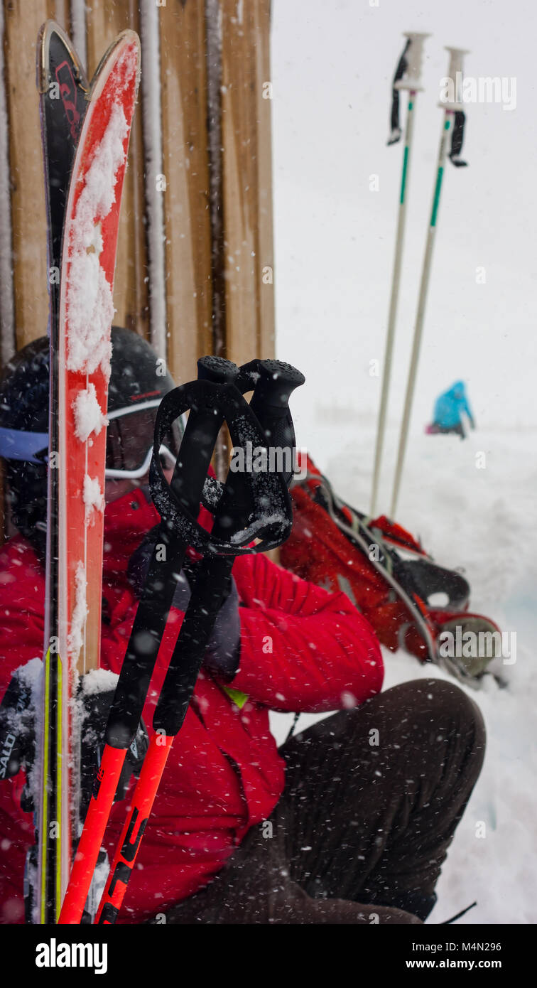 man hiding from snow storm Stock Photo - Alamy