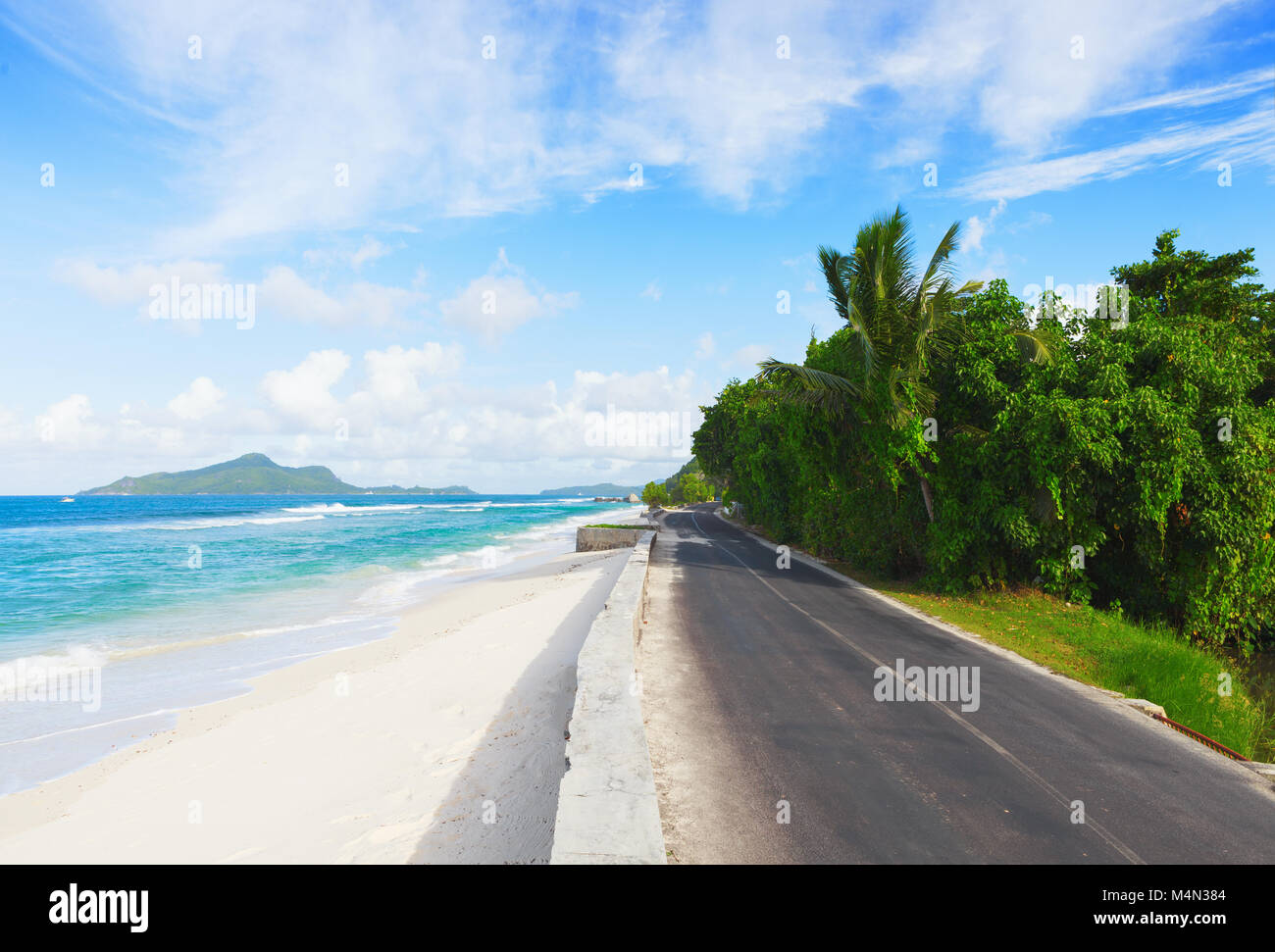 The road along the ocean's beach, Mahe, Seychelles Stock Photo - Alamy