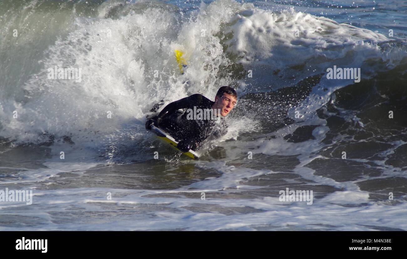 Daring Male Bodyboarder Surfing the Cold North Sea Waves at Aberdeen ...