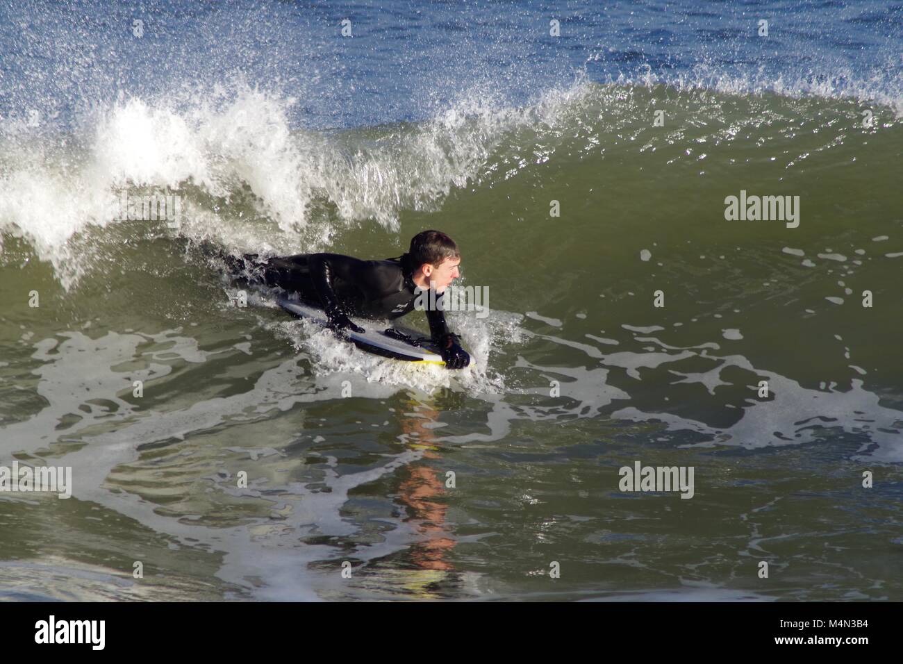 Daring Male Bodyboarder Surfing the Cold North Sea Waves at Aberdeen ...