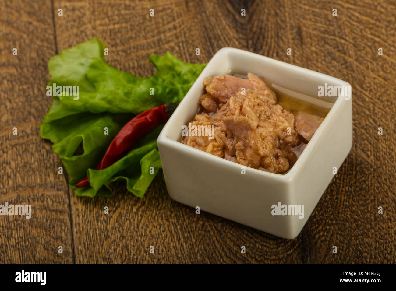 Canned tuna fish in the bowl ready for cooking Stock Photo - Alamy