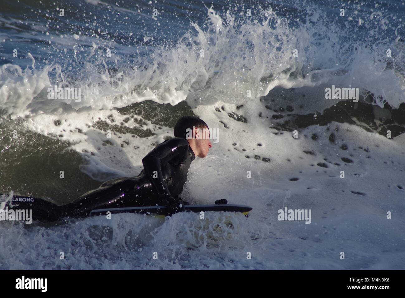 Daring Male Bodyboarder Surfing the Cold North Sea Waves at Aberdeen ...