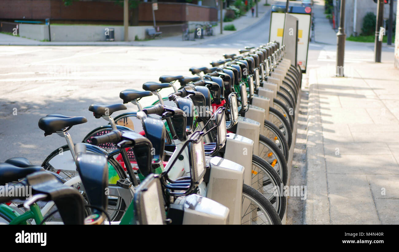 Bicycle sharing and rental system station Stock Photo - Alamy
