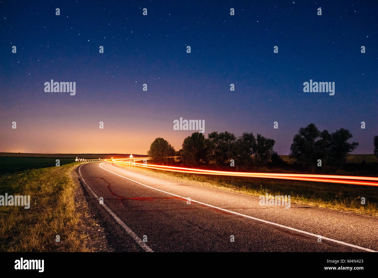 A beautiful summer landscape with highways and tracks from car ...