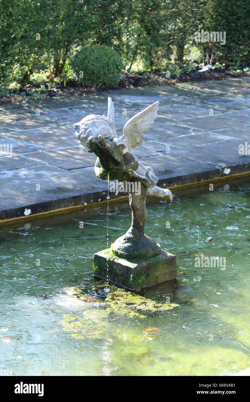 Cherub fountain in a medieval garden, England, UK Stock Photo - Alamy