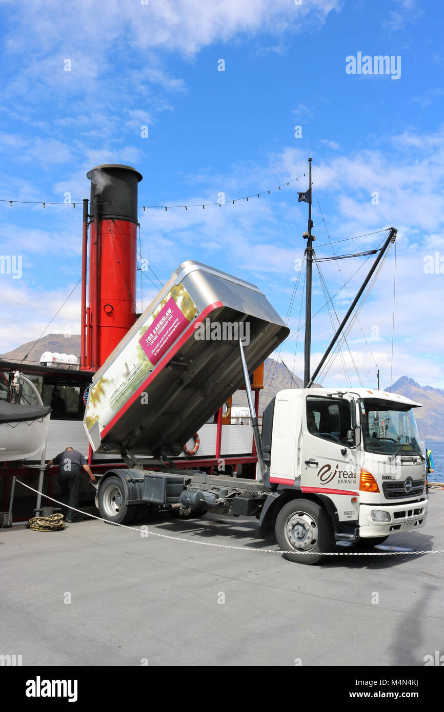 Lorry loading coal onto TSS Earnshaw at the quayside in Queenstown on ...