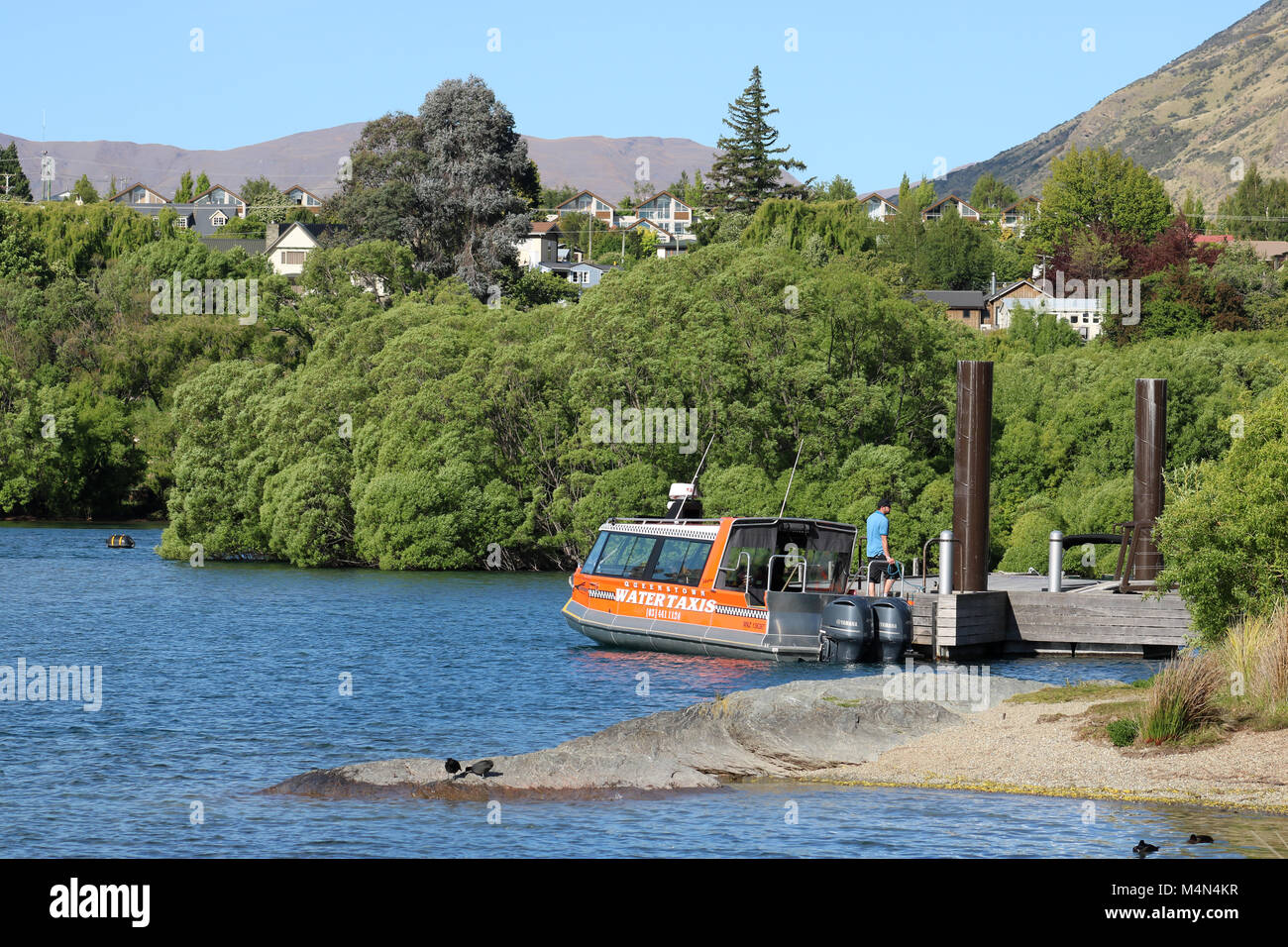 Water Taxi to Queenstown at jetty on Frankton Arm of Lake Wakatipu ...