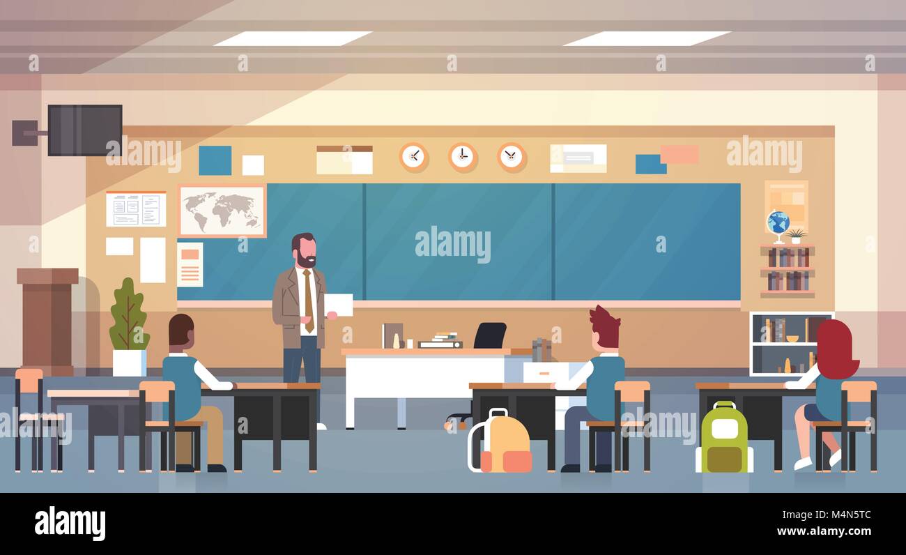 Male Teacher And Pupils In Classroom On Lesson Teaching School Class ...