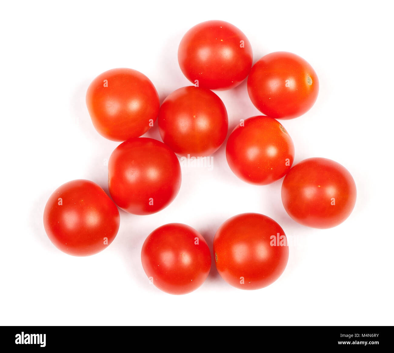 Heap of cherry tomatoes isolated on white background Stock Photo - Alamy