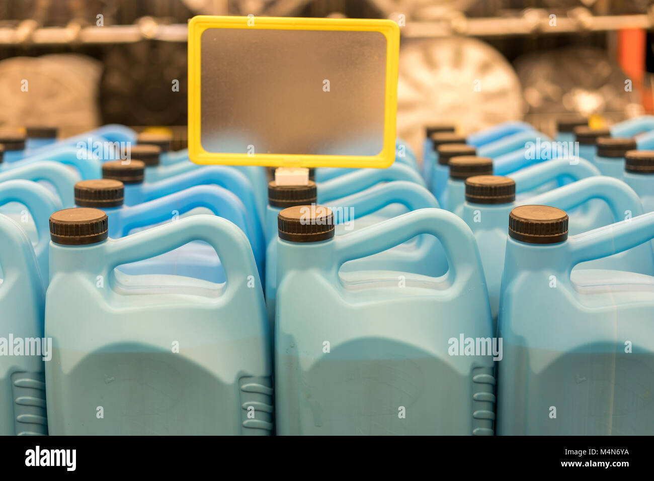 Blue 5 liters. cans in the store Stock Photo - Alamy