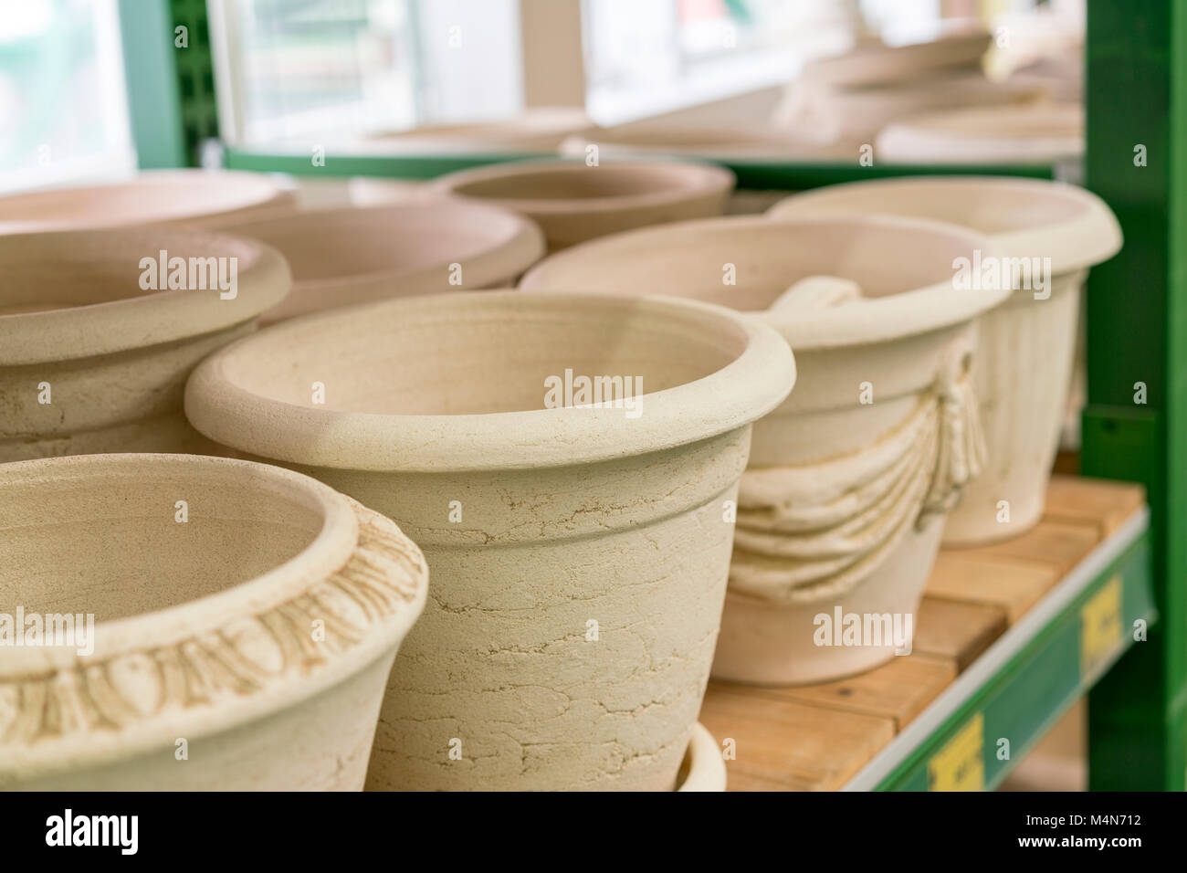Clay pots on the shelf Stock Photo - Alamy