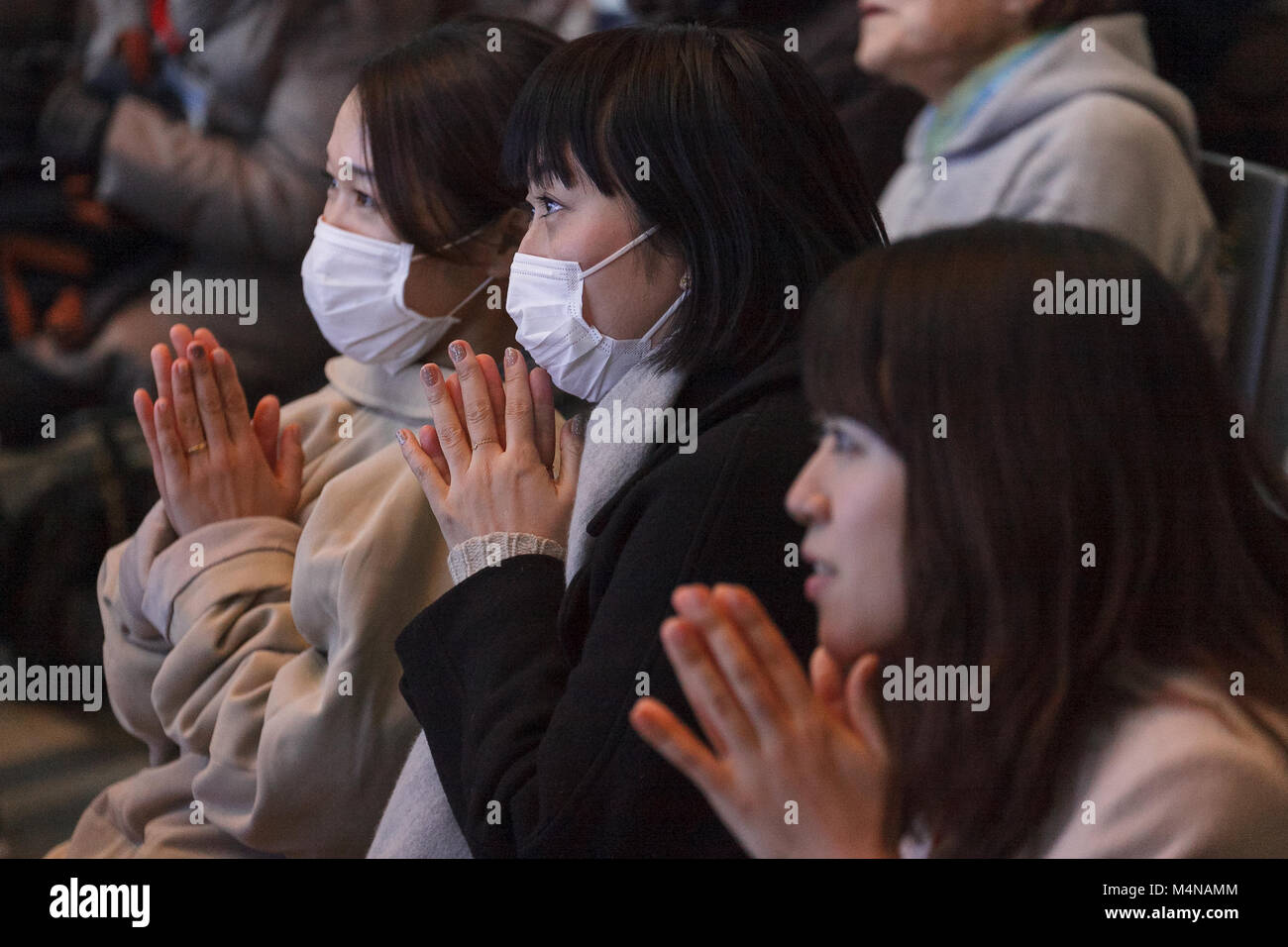 Crowds gather to watch a super high vision 8K screen broadcasting ...