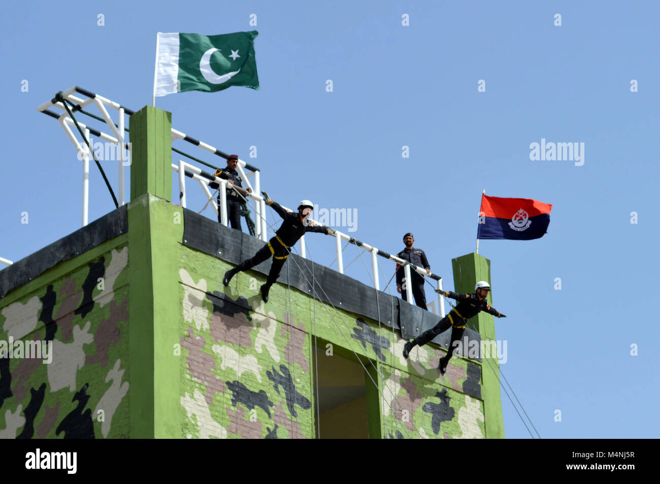 Quetta. 17th Feb, 2018. Police cadets display their skills during the ...