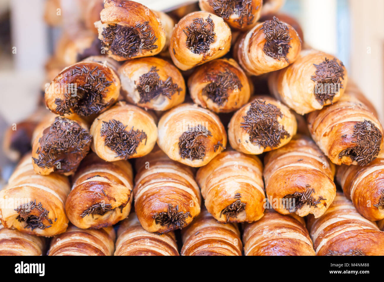 A bunch of fresh chocolate rolls in an Italian backery Stock Photo - Alamy
