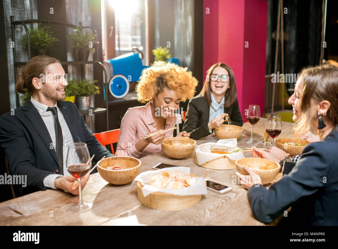 Business people during the dinner in the restaurant Stock Photo - Alamy