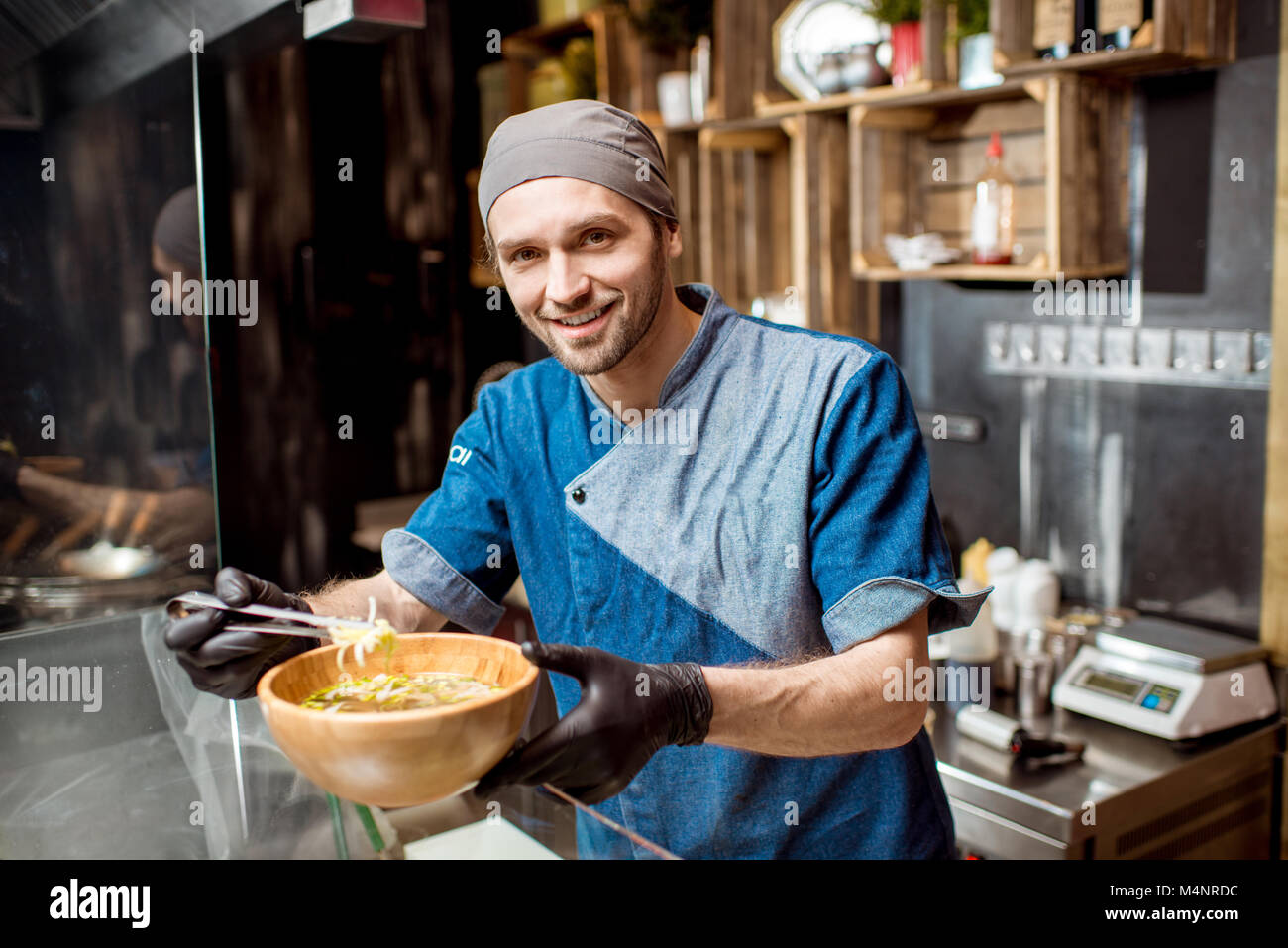 Black man male cook hi-res stock photography and images - Alamy