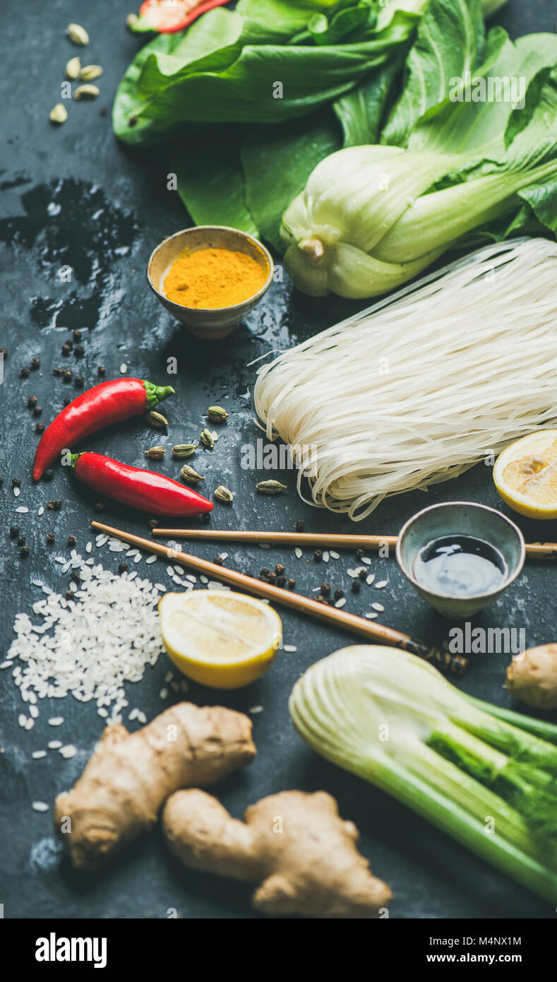 Asian cuisine ingredients over slate stone background. Vegetables ...