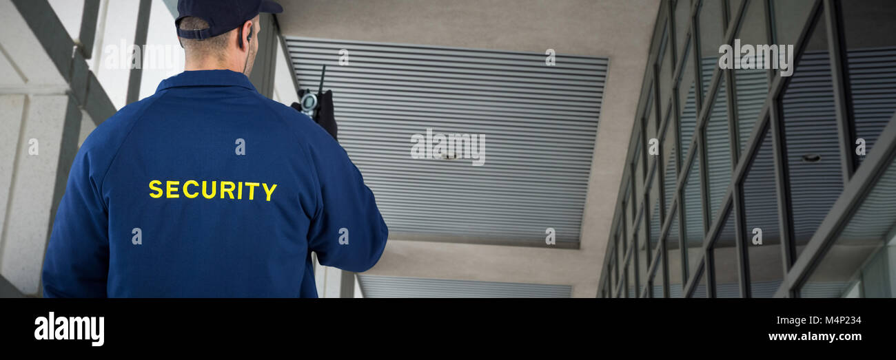 Security guard talking hi-res stock photography and images - Alamy