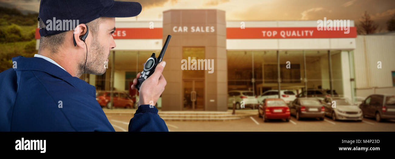 Security guard talking walkie talkie hi-res stock photography and ...