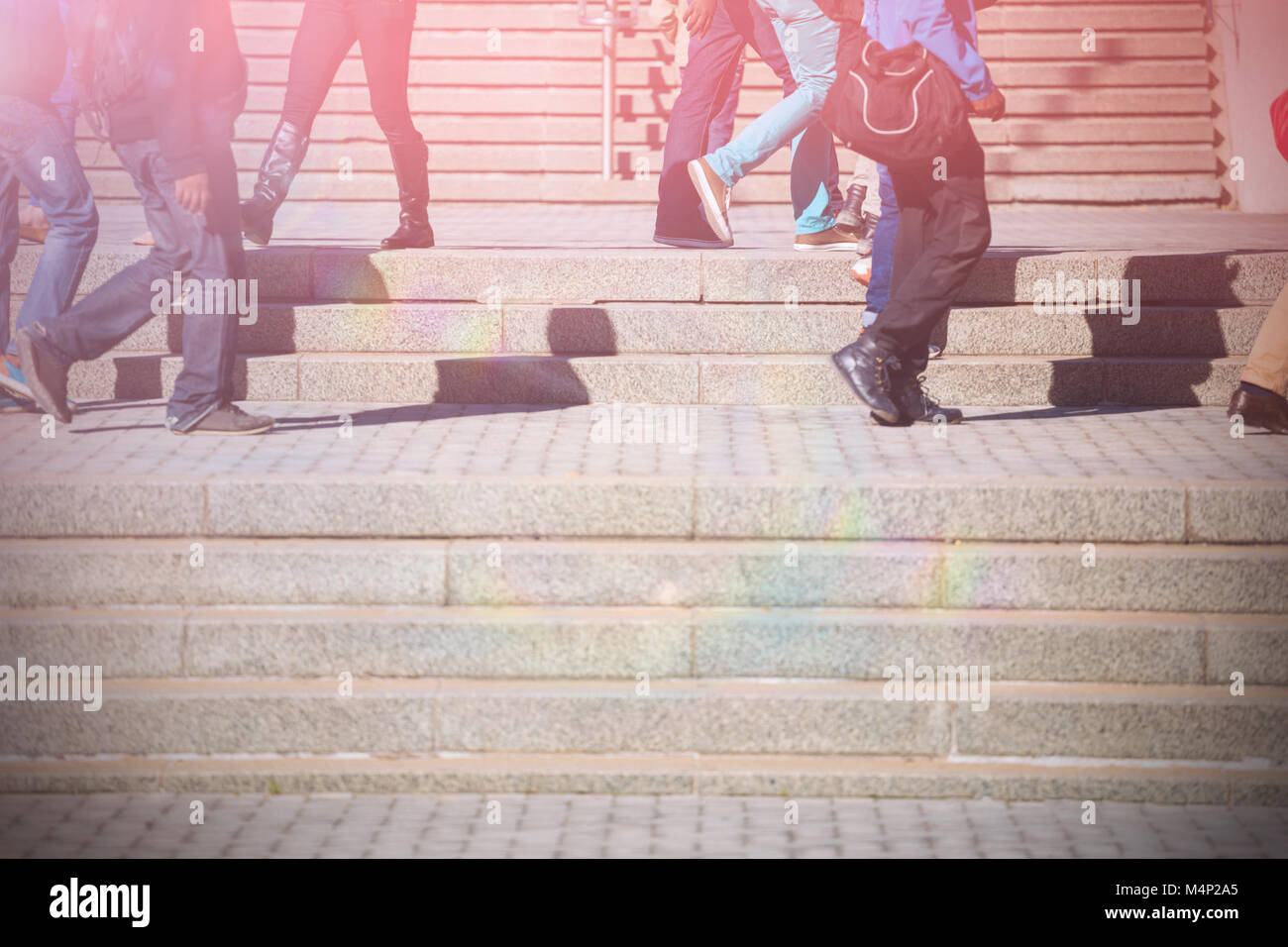 People walking on staircase Stock Photo - Alamy