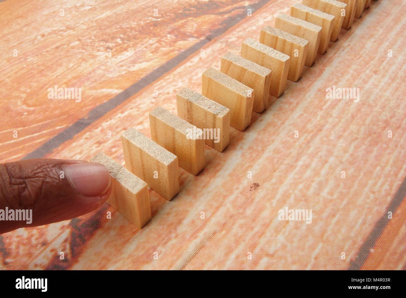 Cause and effect domino hi-res stock photography and images - Alamy