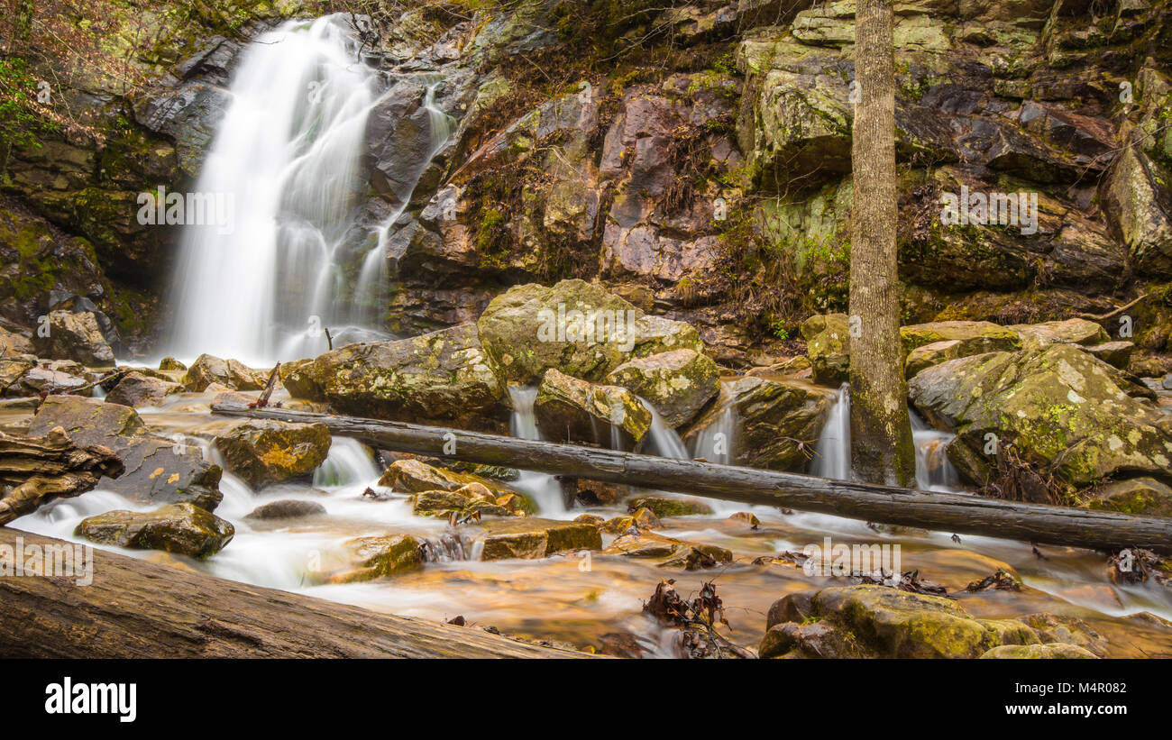 A beautiful, hard to find waterfall flows into a ravine near the top of ...