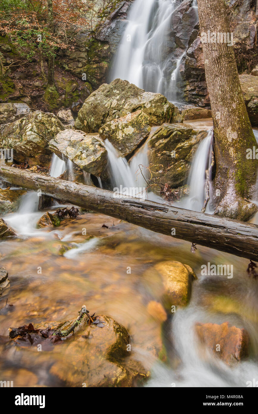 A beautiful, hard to find waterfall flows into a ravine near the top of ...