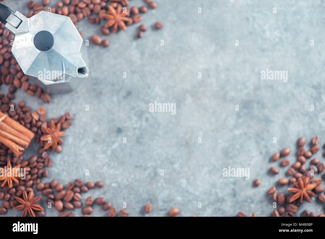 Geyser coffee maker top view with coffee beans, cinnamon, and anise ...
