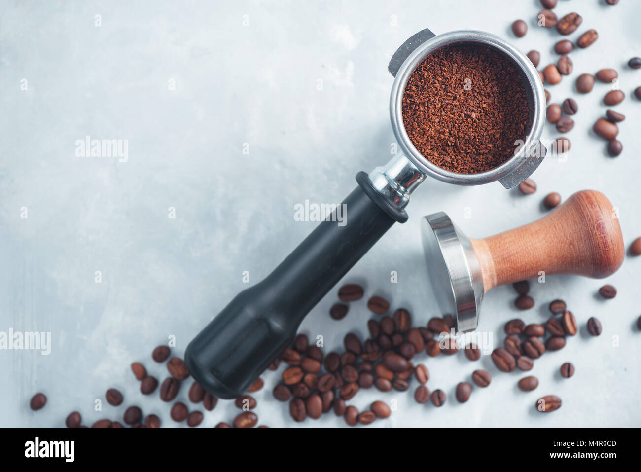 Portafilter with ground coffee close-up. Equipment for brewing coffee ...