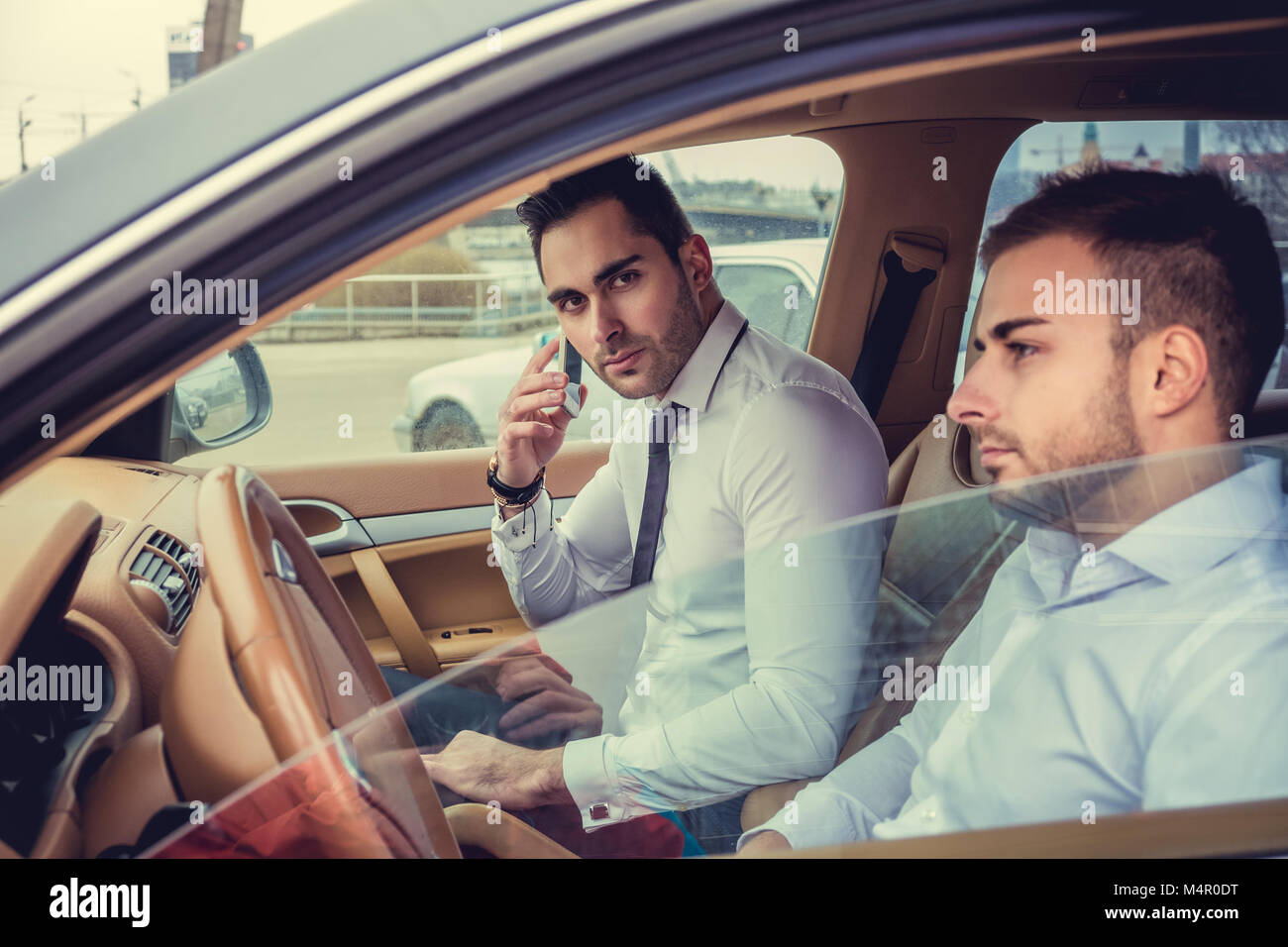 Two guys driving car hi-res stock photography and images - Alamy
