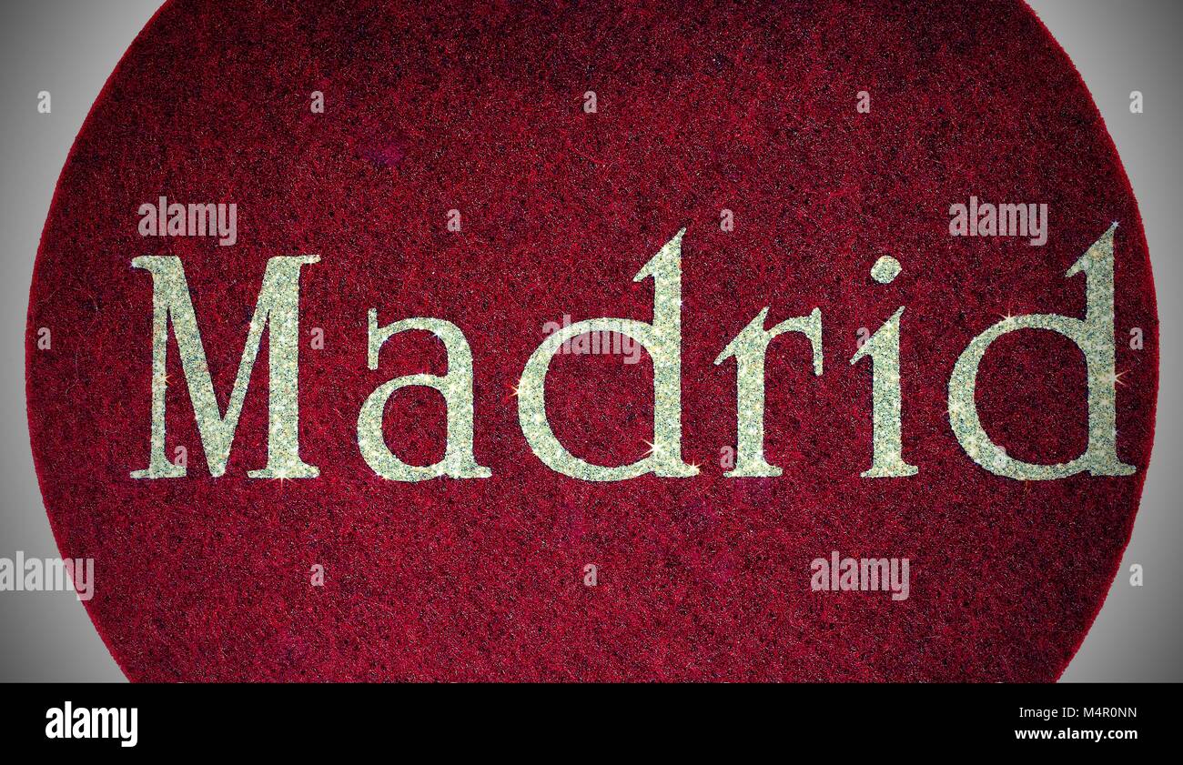 Madrid written of a Spanish city on fabric background Stock Photo - Alamy