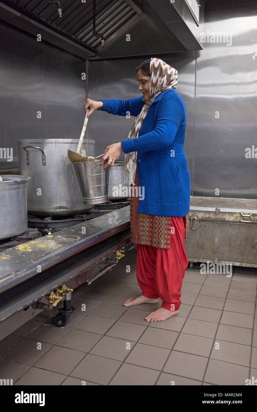 Indian lady cooking hi-res stock photography and images - Alamy