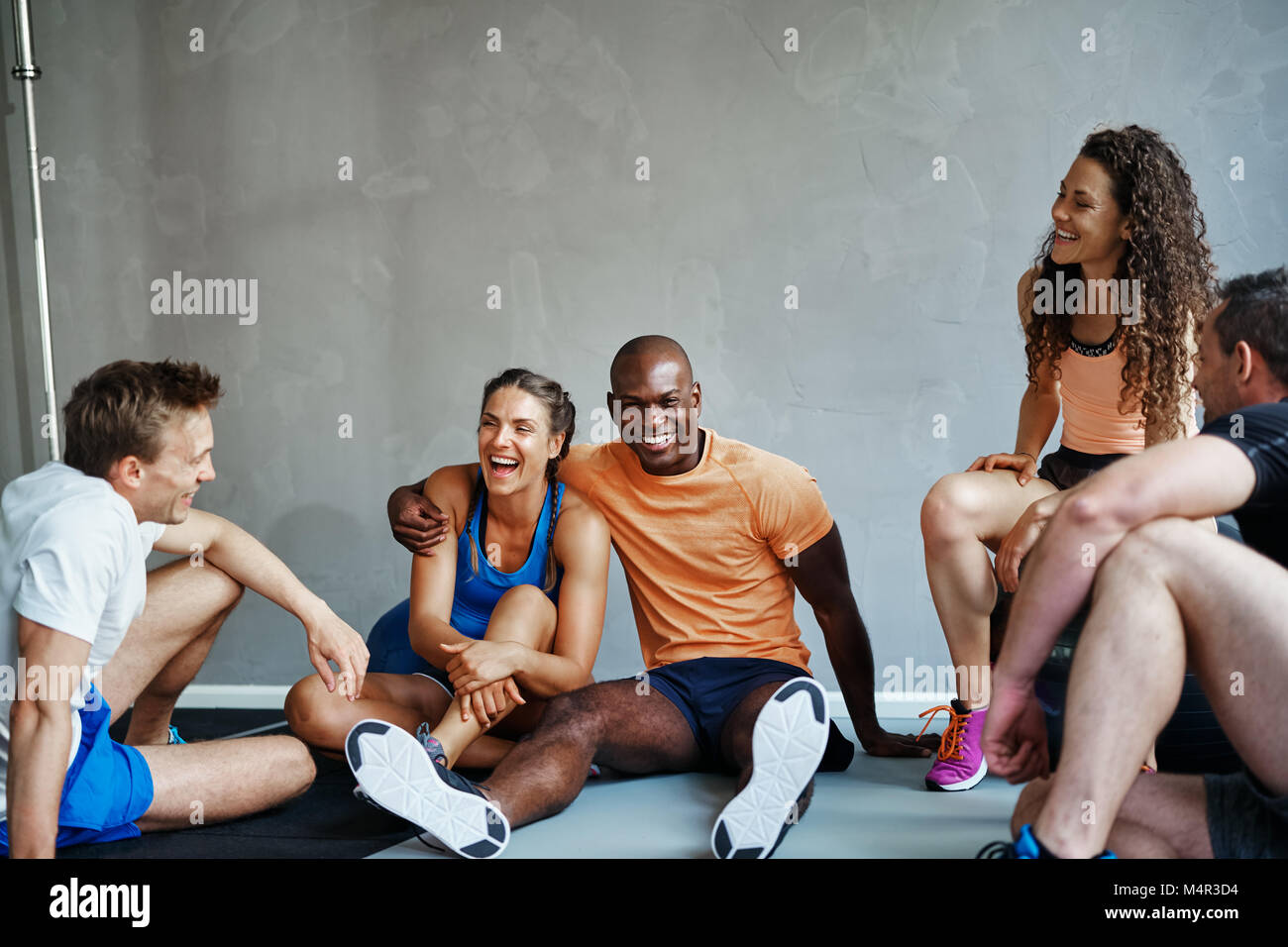 Real people at the gym smiling laughing hi-res stock photography and ...