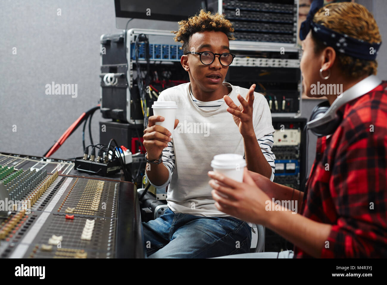 Discussion in studio Stock Photo - Alamy
