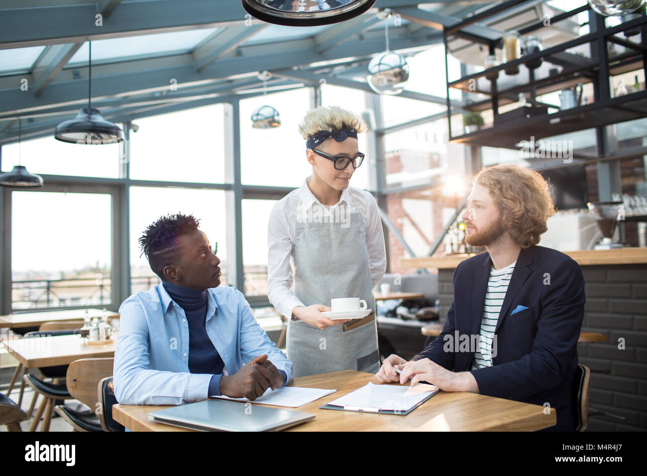 Person serving tea hi-res stock photography and images - Alamy