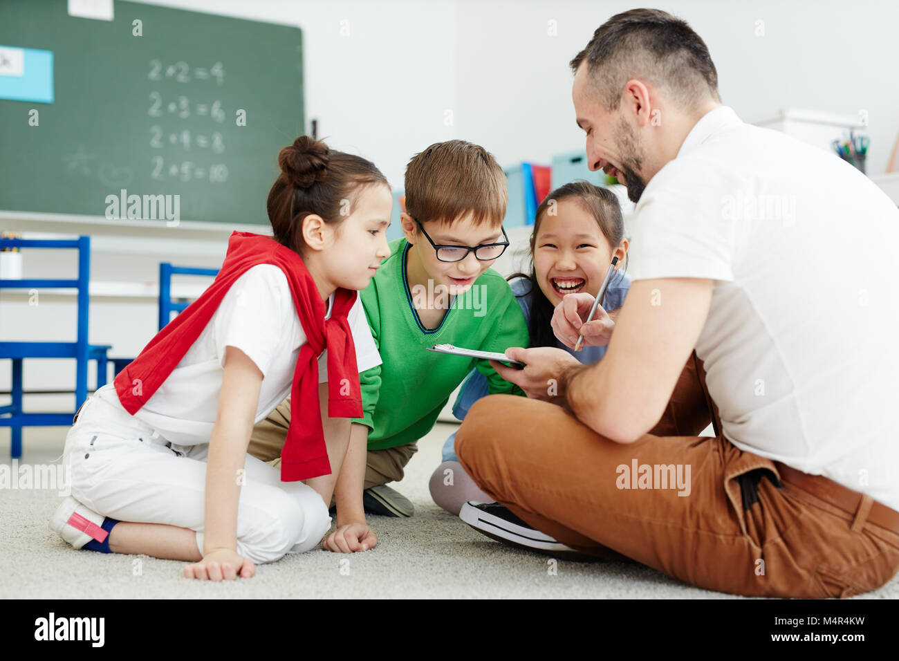 Having fun at lesson Stock Photo - Alamy