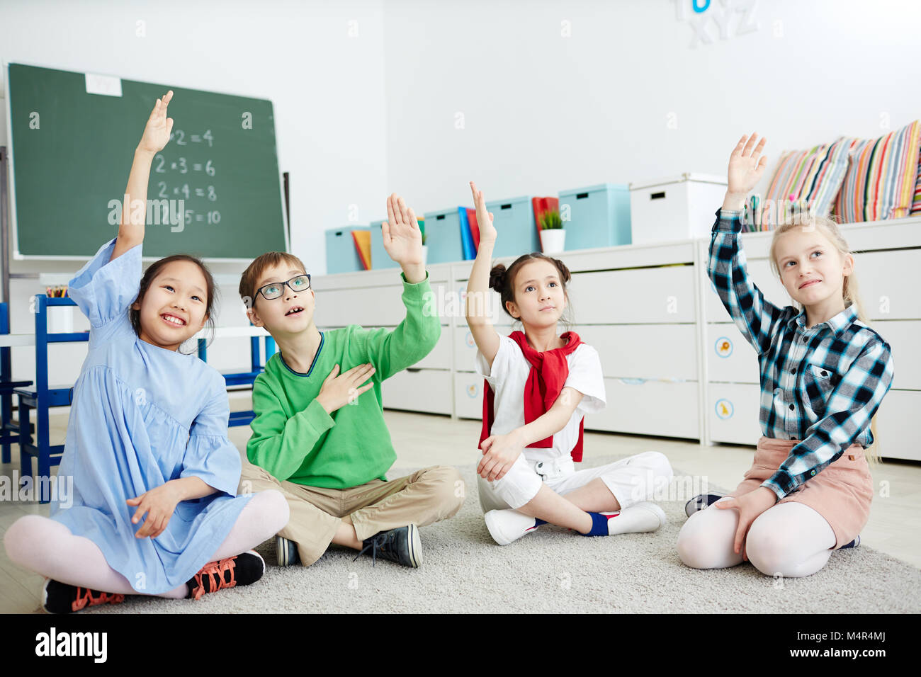 Kids know the answer Stock Photo - Alamy