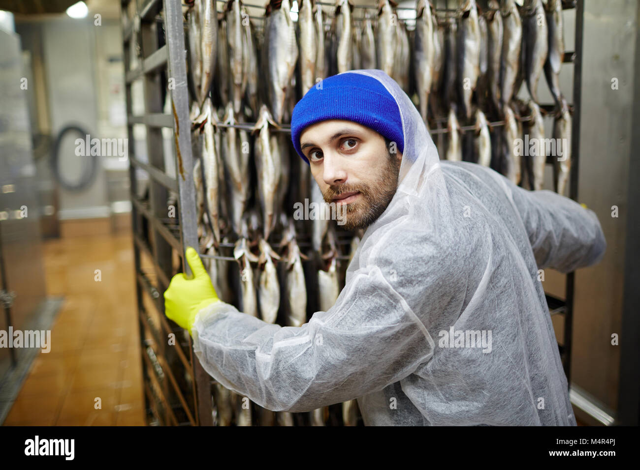 Pushing fish cart Stock Photo - Alamy