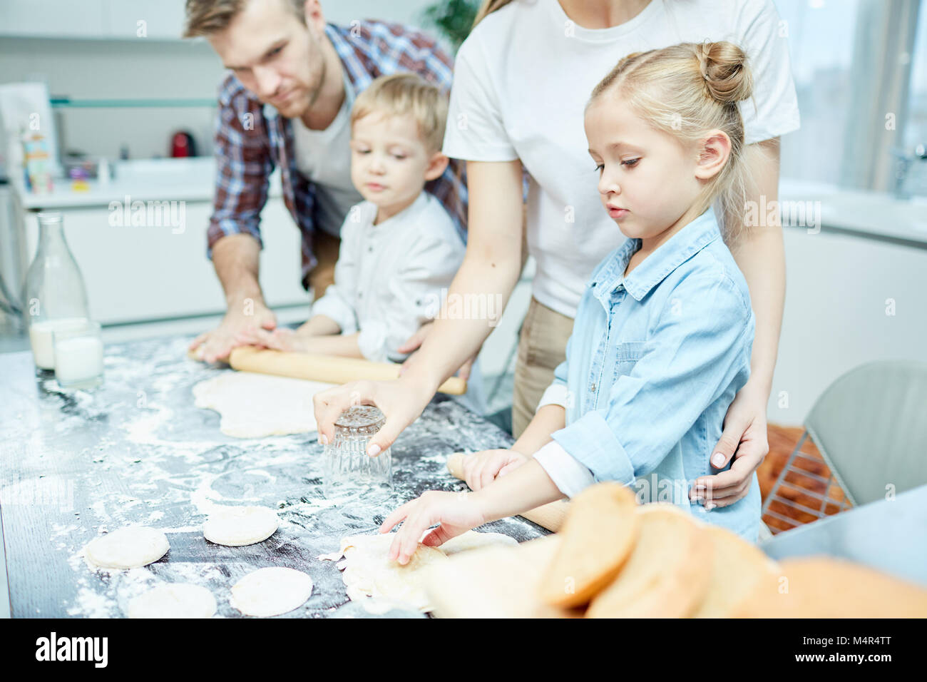 Father and son making bread hi-res stock photography and images - Alamy