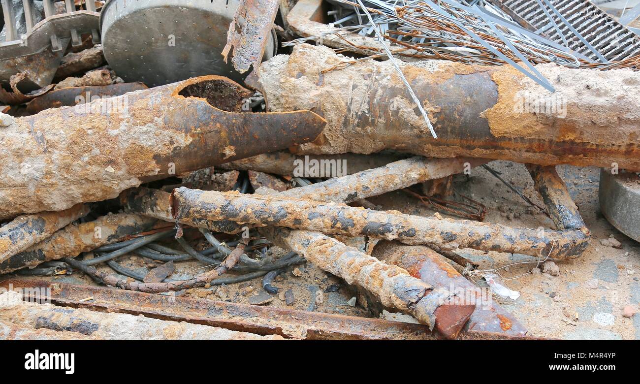 Rusted tubes of a construction site for laying technological ...