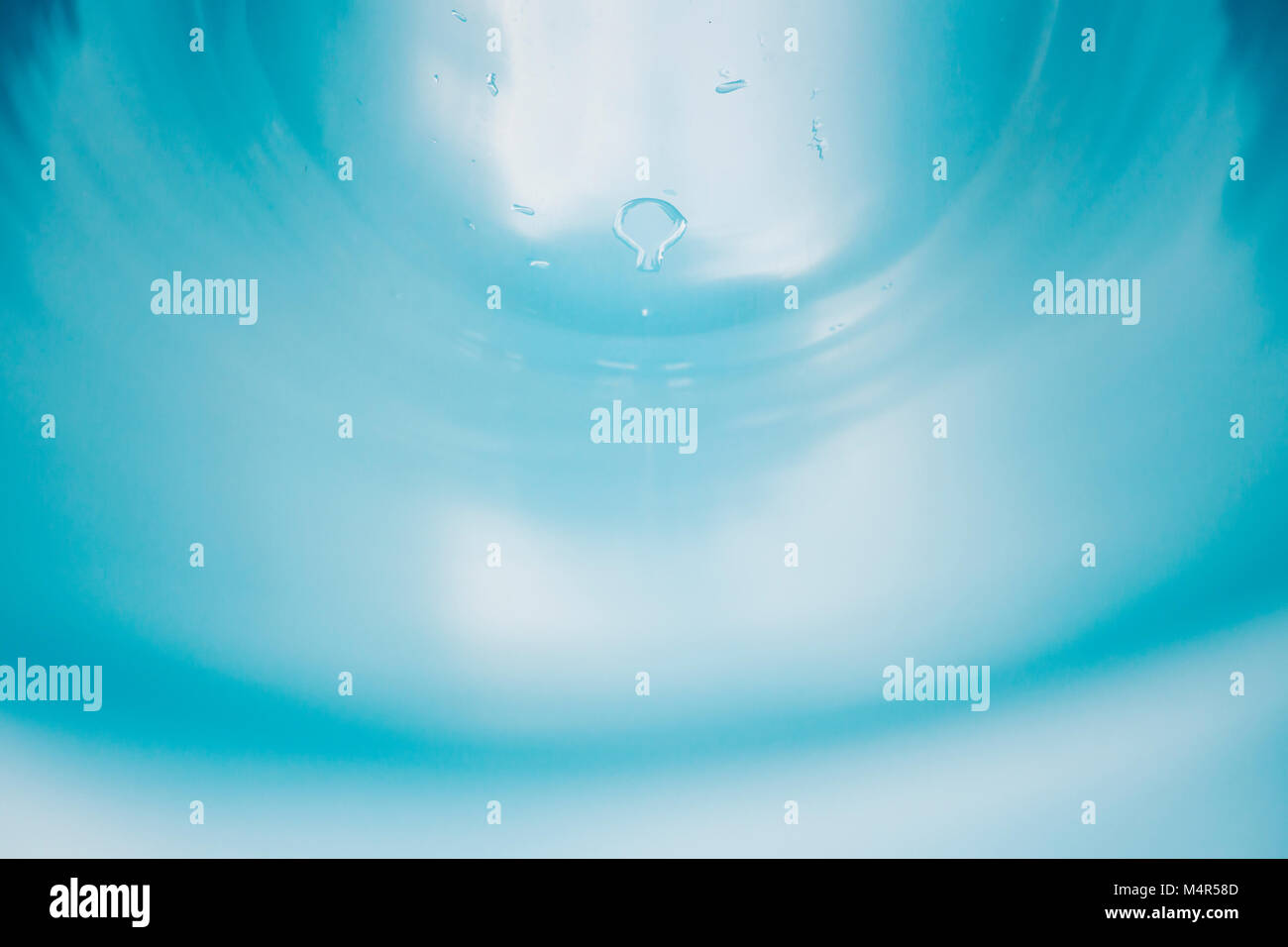 Abstract blue water slide with water drops for background, high ...