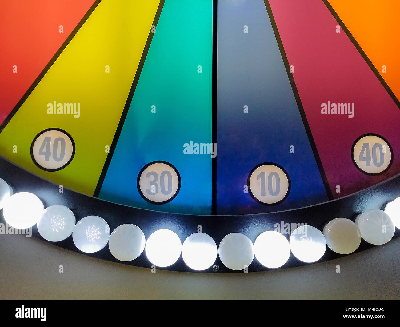 colorful carnival game with numbers with illuminated lights Stock Photo ...