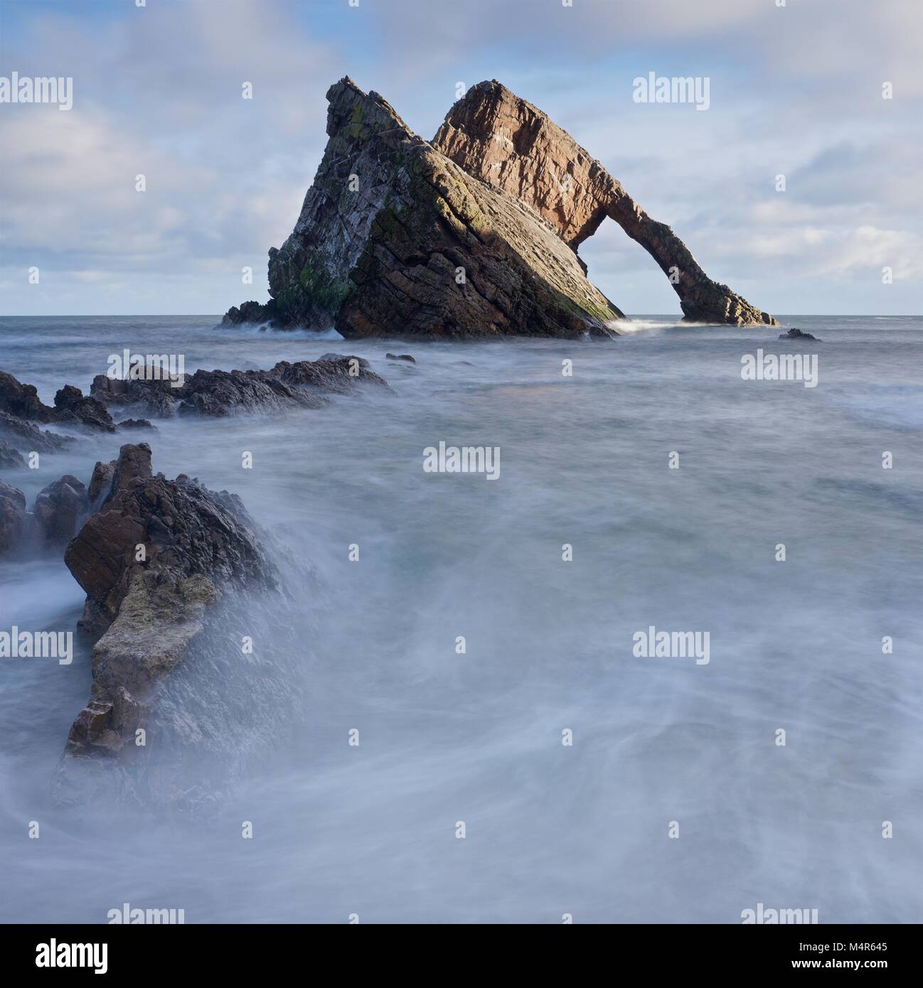 Sunrise at Bow Fiddle Rock Stock Photo - Alamy