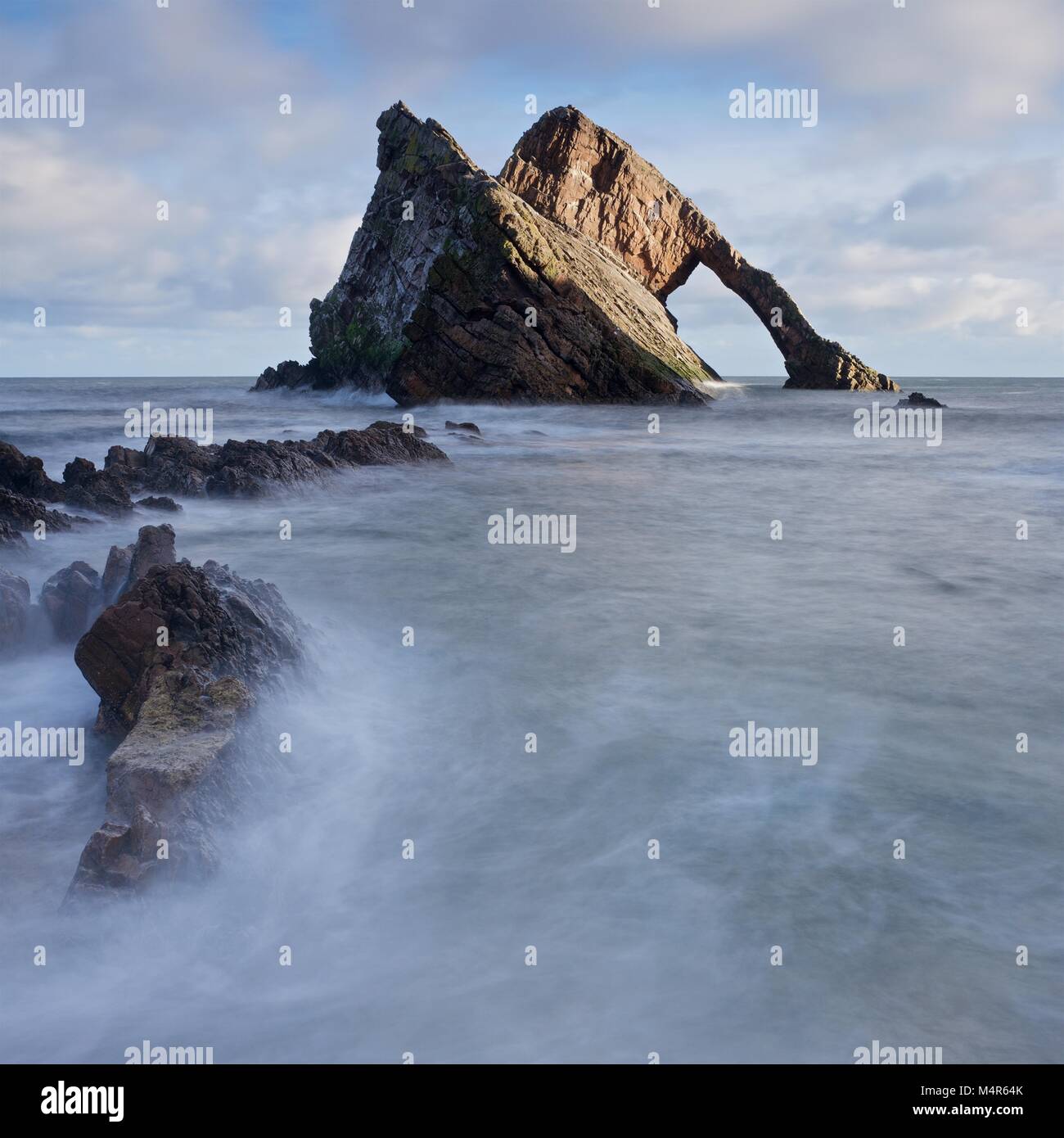 Sunrise at Bow Fiddle Rock Stock Photo - Alamy
