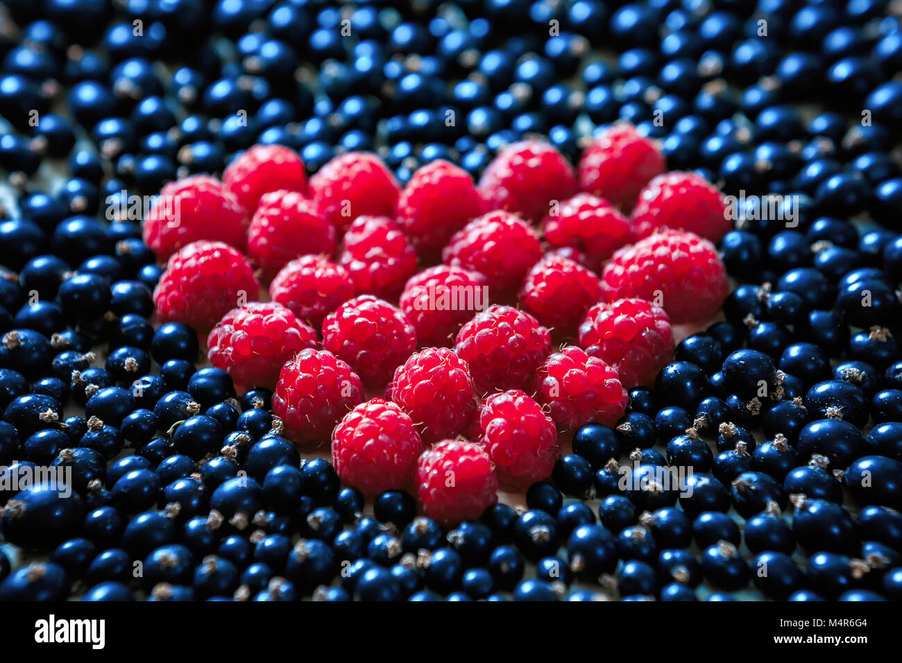 Heart made from raspberry and blueberry Stock Photo - Alamy