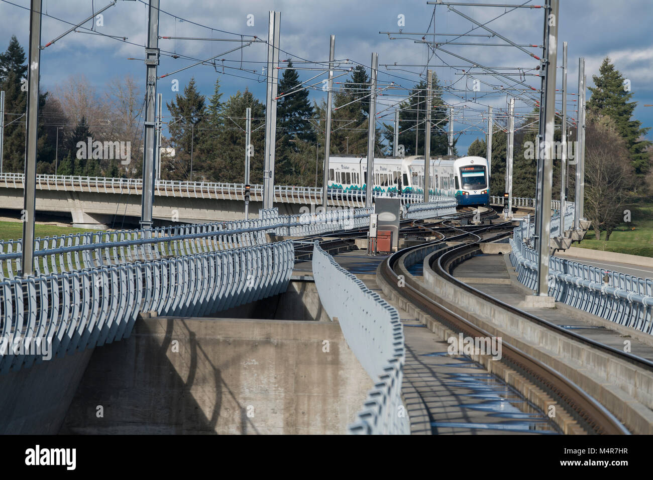 United States, Washington, Seattle, Light rail train entering airport ...